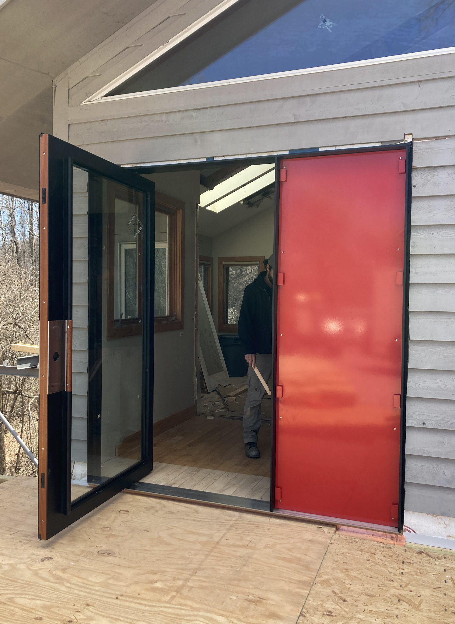Steel Pivot Door with Red Powdercoated Panel | Architectural Woodcraft ...
